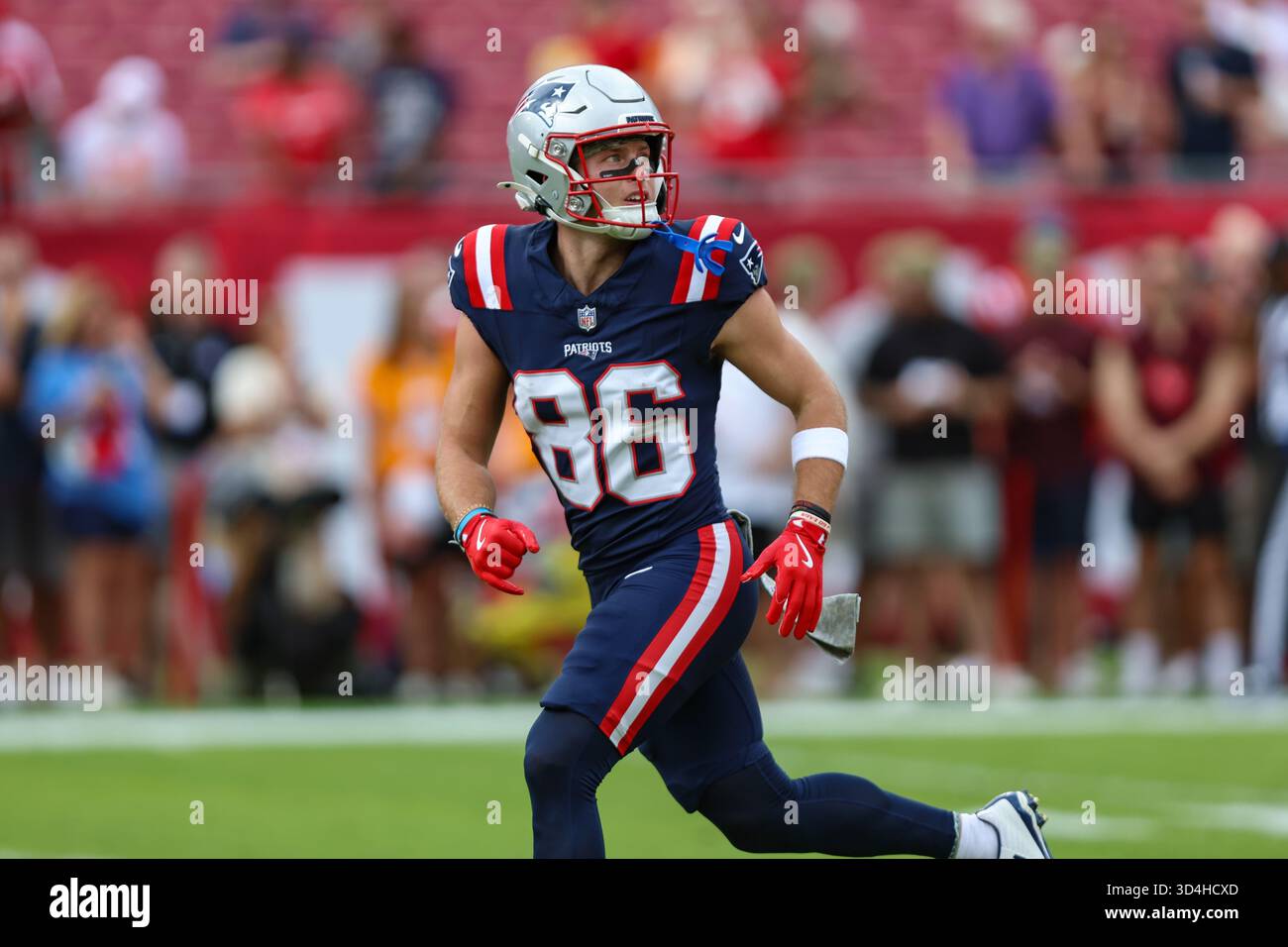 New England Patriots wide receiver Efton Chism III (86) warms up before ...