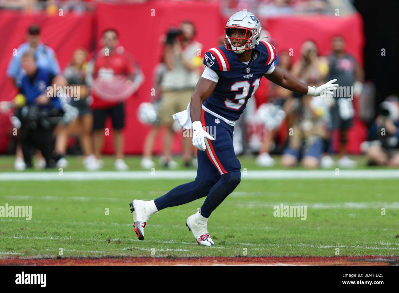 New England Patriots safety Craig Woodson (31) runs to cover a possible ...