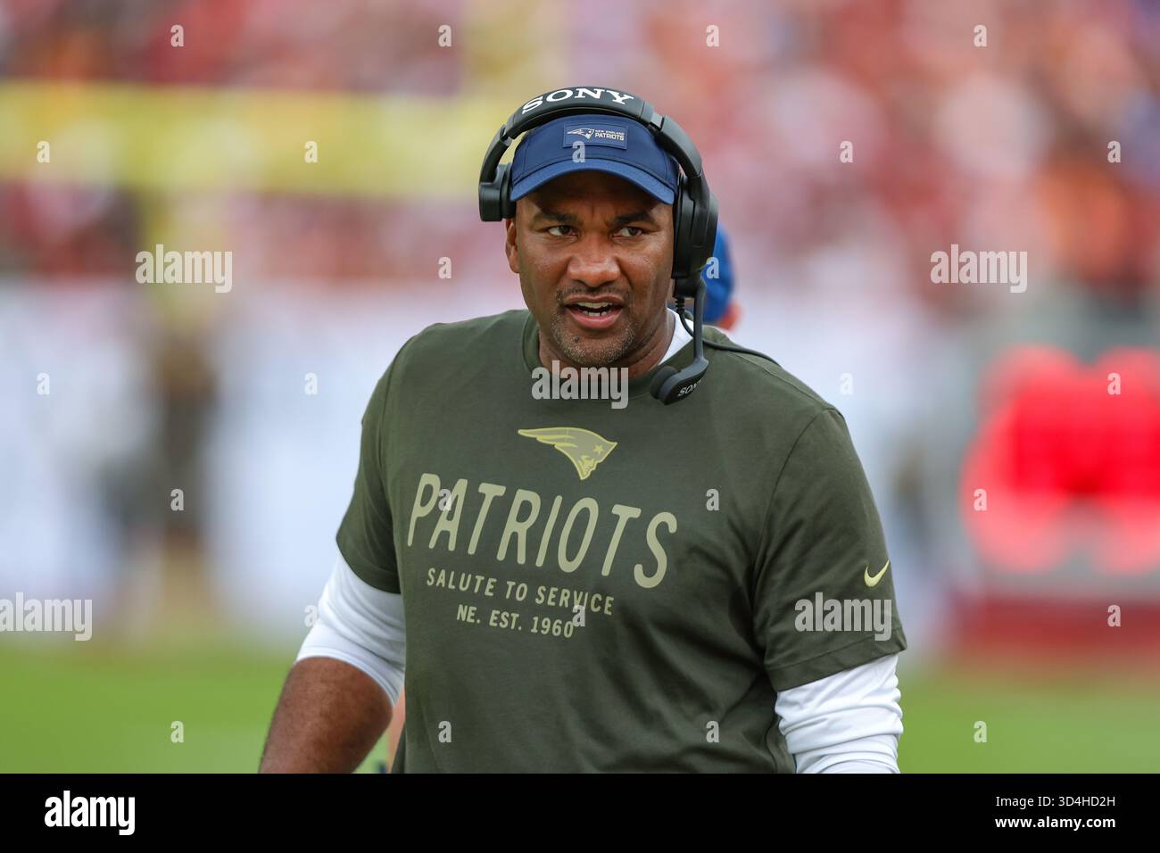 New England Patriots safeties coach Scott Booker walks the sideline ...