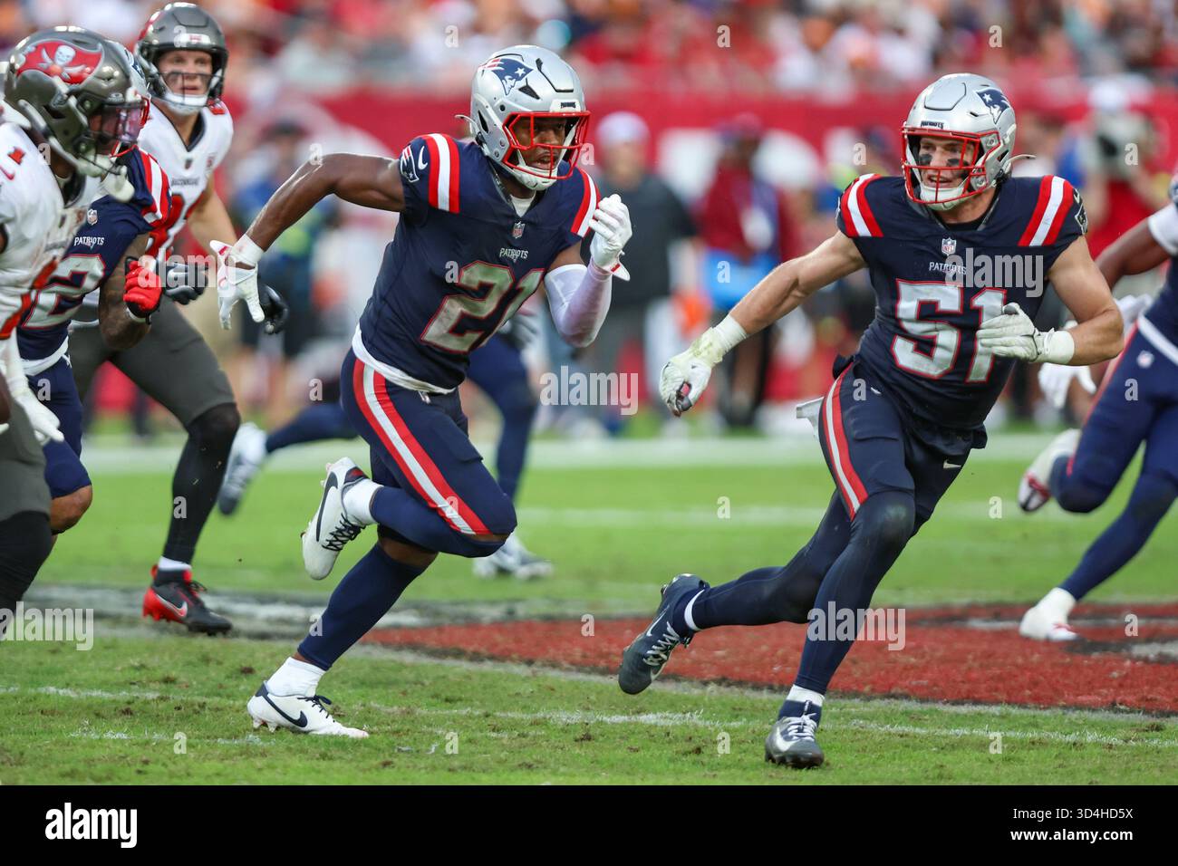New England Patriots safety Jaylinn Hawkins (21) and linebacker Jack ...