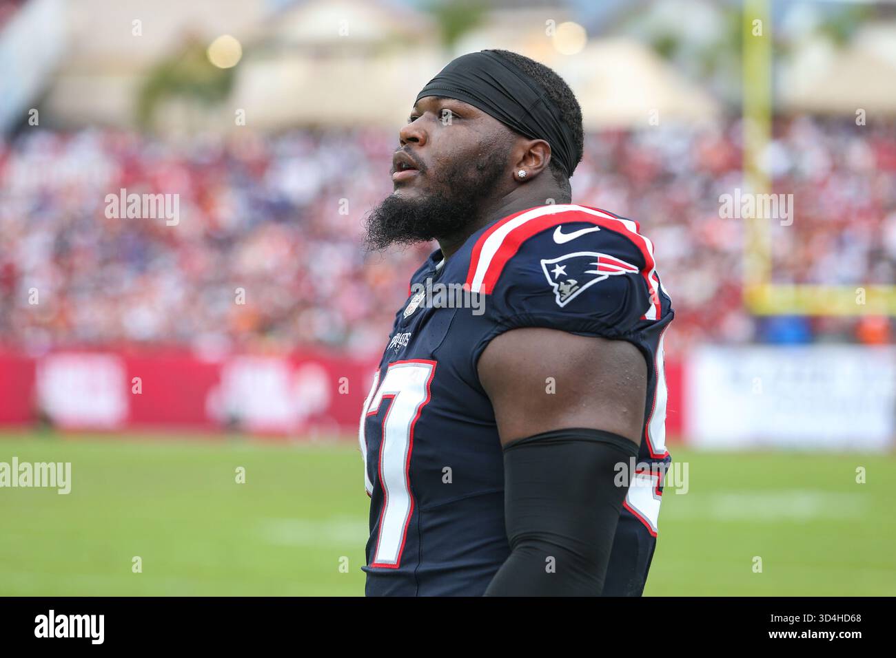 New England Patriots defensive end Milton Williams (97) walks the ...