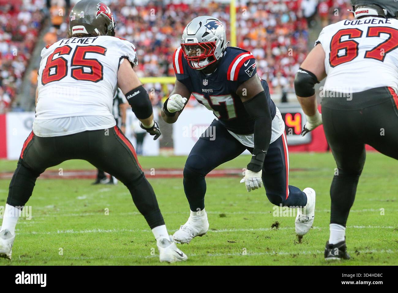 New England Patriots defensive end Milton Williams (97) rushes during ...