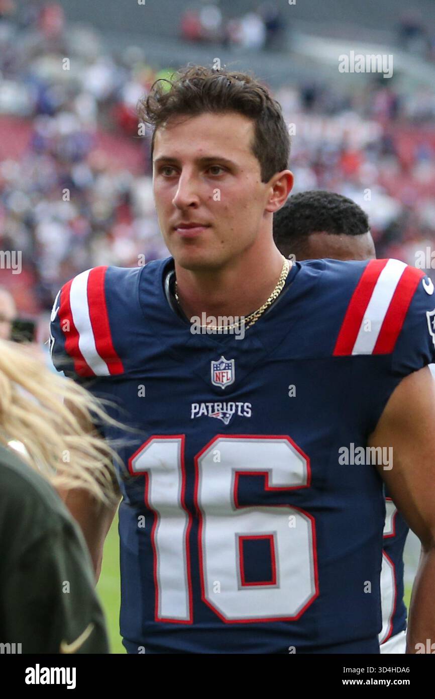 New England Patriots quarterback Tommy DeVito (16) leaves the field ...