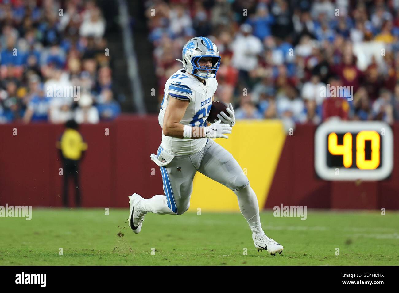 Detroit Lions tight end Sam LaPorta (87) runs with the ball after ...