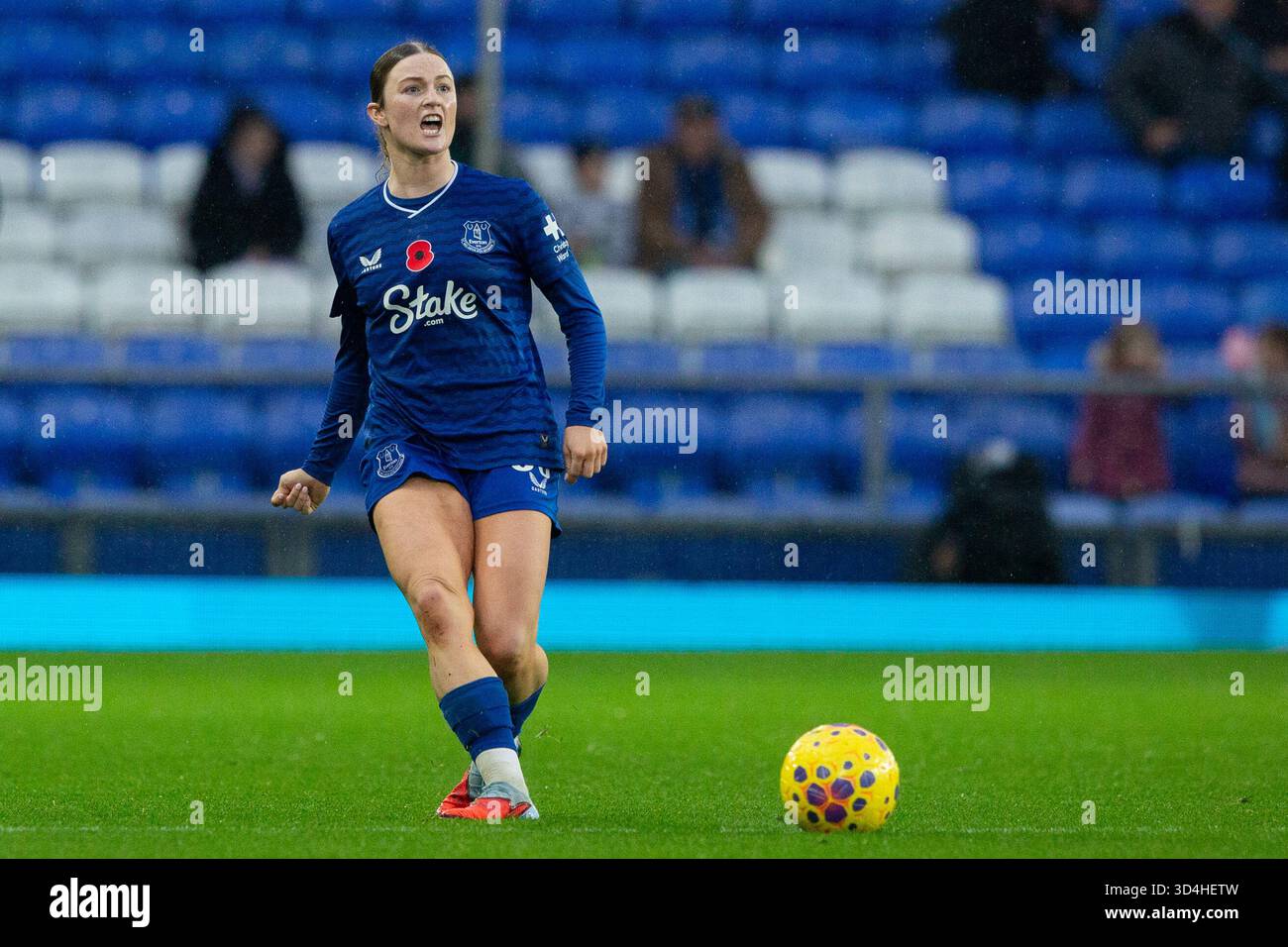 Ruby Mace (30 Everton) shouts to a teammate as she plays a pass ...