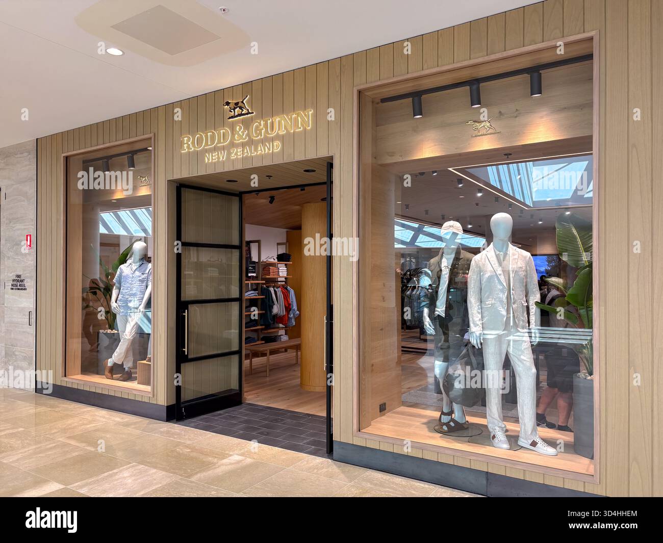 Rodd & Gunn retail store facade in a shopping mall, featuring light ...