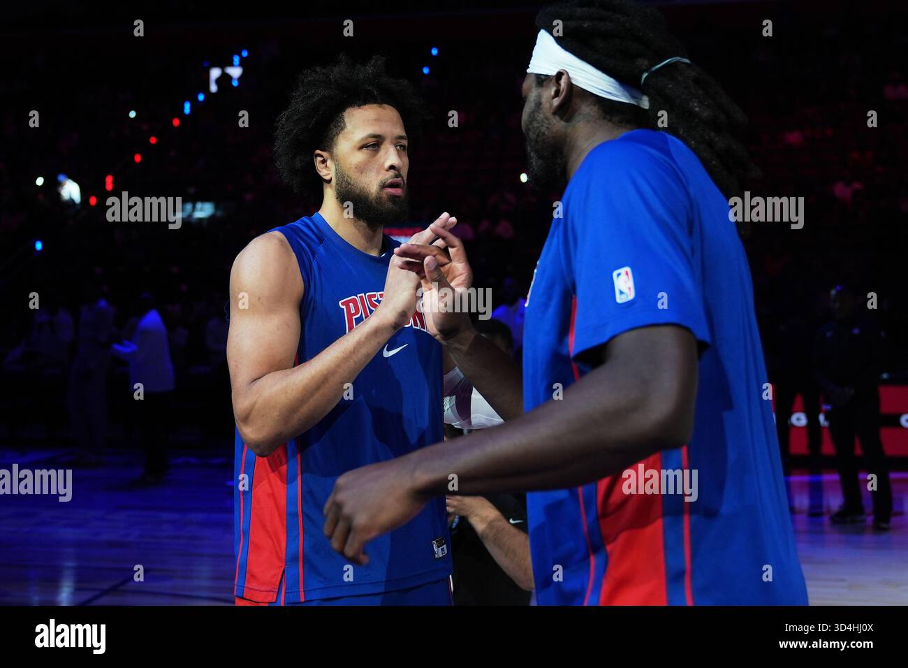 Detroit Pistons guard Cade Cunningham, left, greets Isaiah Stewart ...