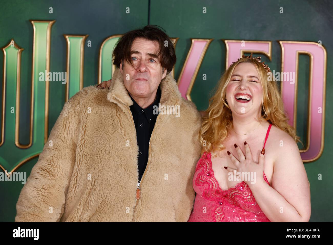Jonathan Ross, left, and Honey Ross pose for photographers upon arrival ...