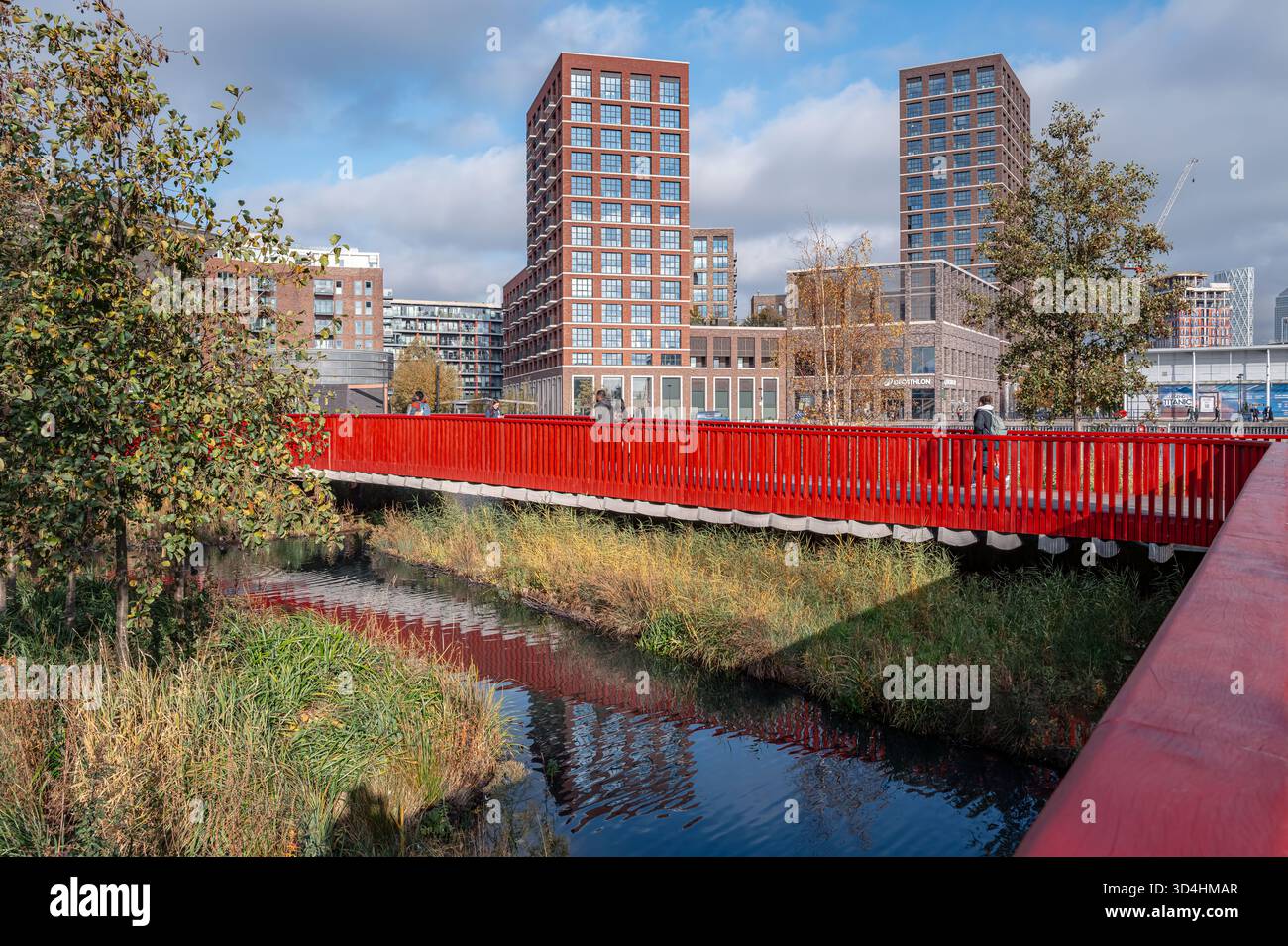 Rafter Walk, Canada Water, London. The red walkway was designed by ...