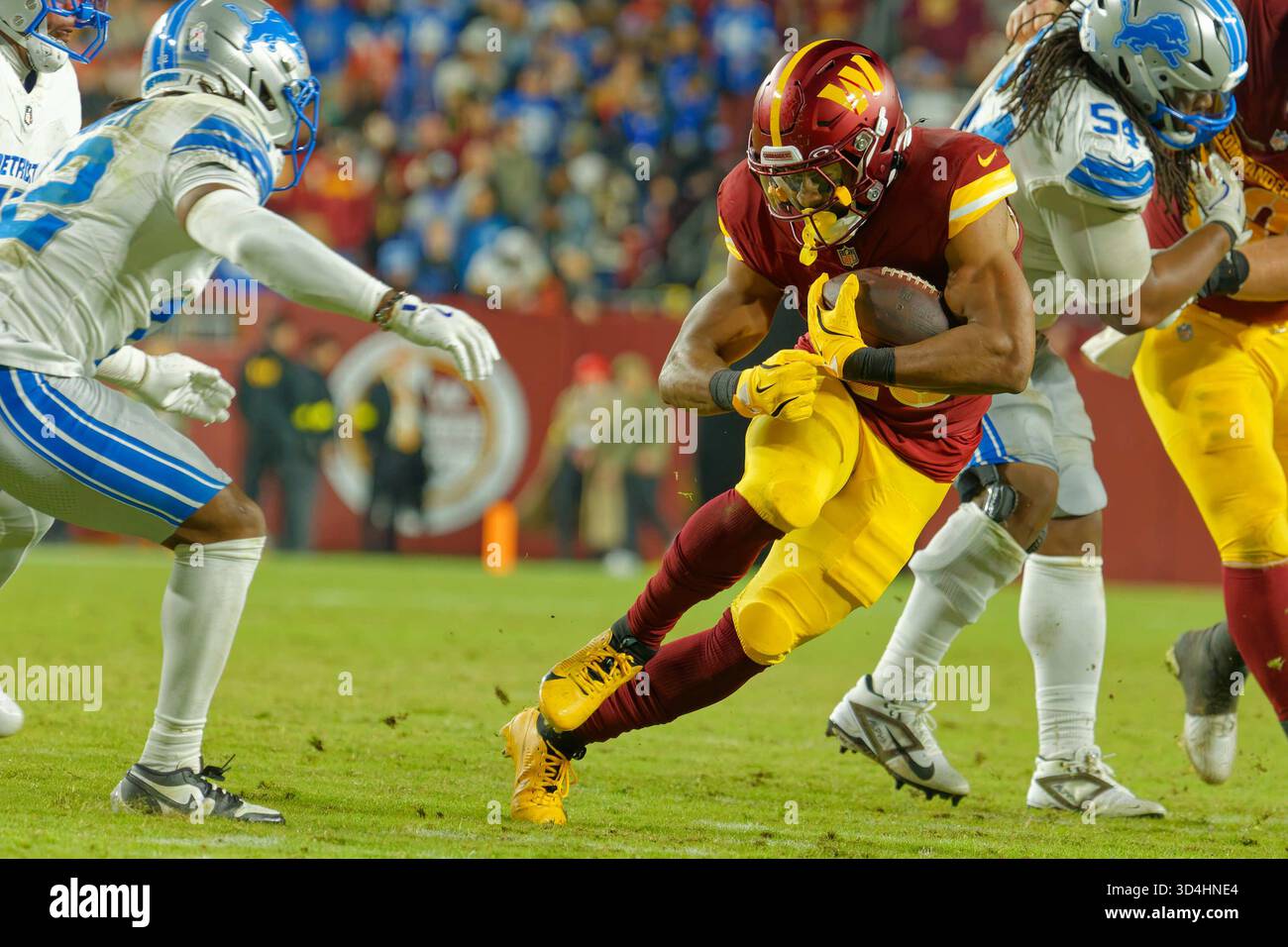 Washington Commanders Running Back Jeremy McNichols (26) avoiding ...