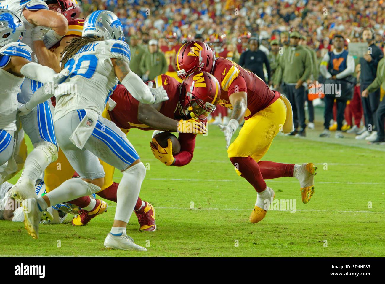Washington Commanders Running Back Chris Rodriguez Jr. (36) tries to ...