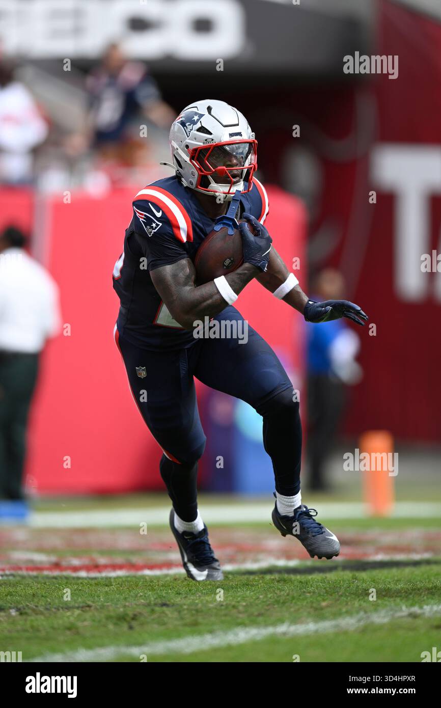New England Patriots running back Terrell Jennings warms up before an ...