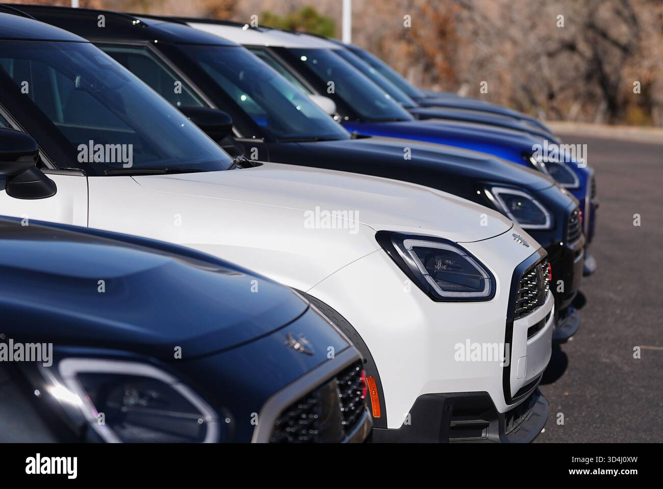 Unsold 2026 Countryman utility vehicles sit in a row at a Mini ...
