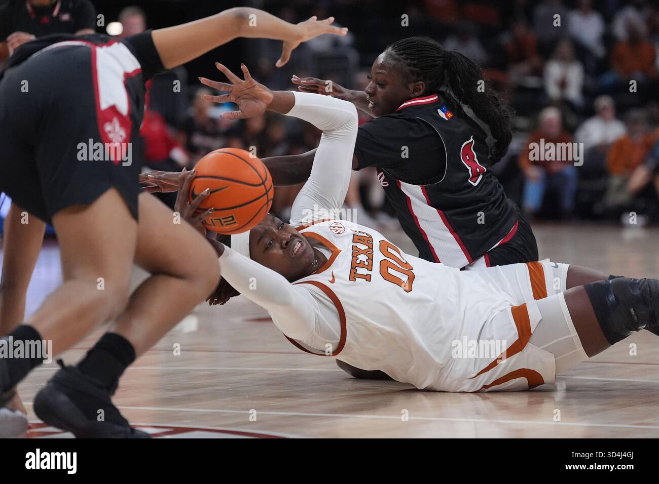 Texas center Kyla Oldacre (00) and Louisiana Lafayette forward Lily Ba ...