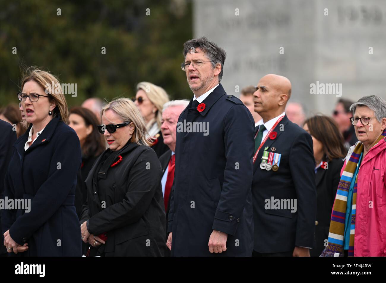 Melbourne Lord Mayor Nick Reece (centre) during a Remembrance Day ...
