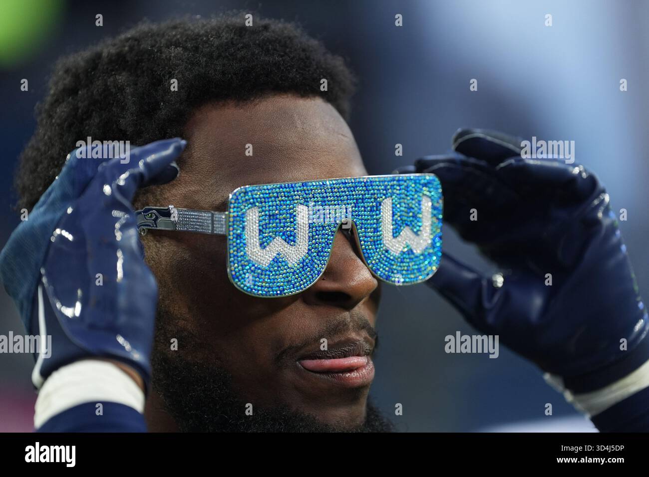 Seattle Seahawks cornerback Devon Witherspoon wears "W" glasses to ...