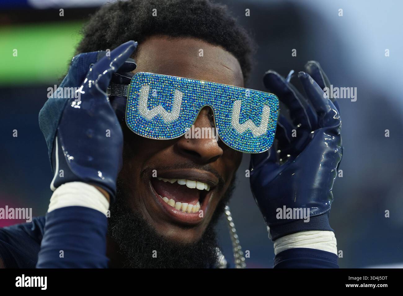 Seattle Seahawks cornerback Devon Witherspoon wears "W" glasses to ...