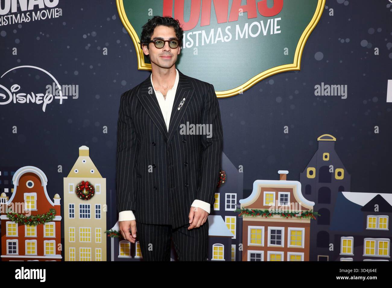 Joe Jonas attends the Disney+ premiere of "A Very Jonas Christmas Movie ...