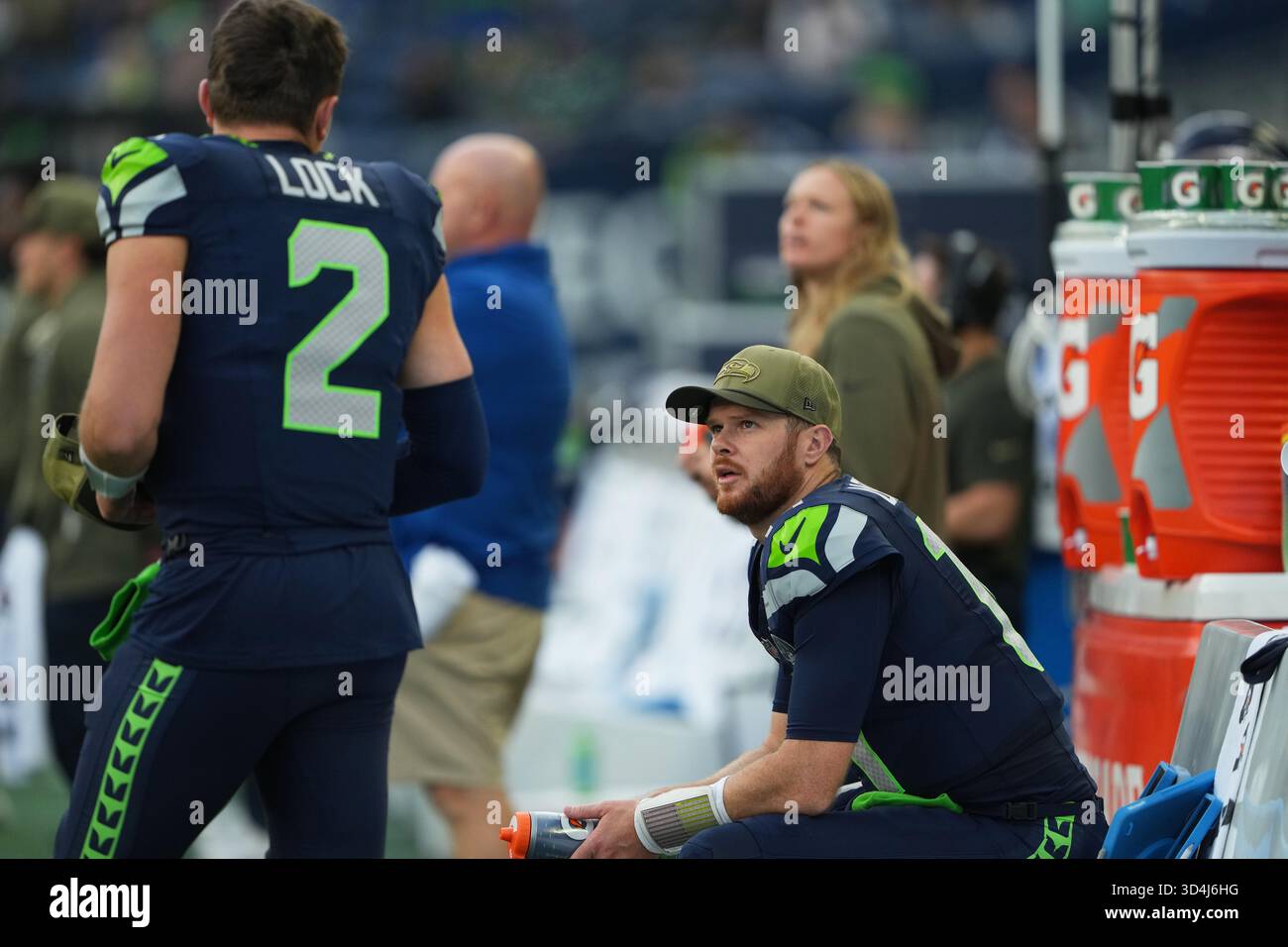Seattle Seahawks quarterback Drew Lock (2) talks with quarterback Sam ...