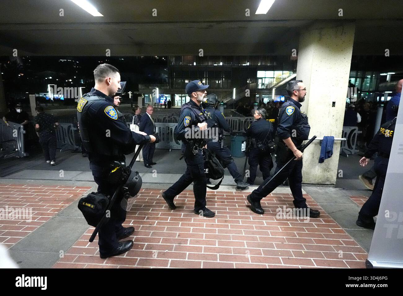 University police walk past the front entrance of "This Is the Turning ...