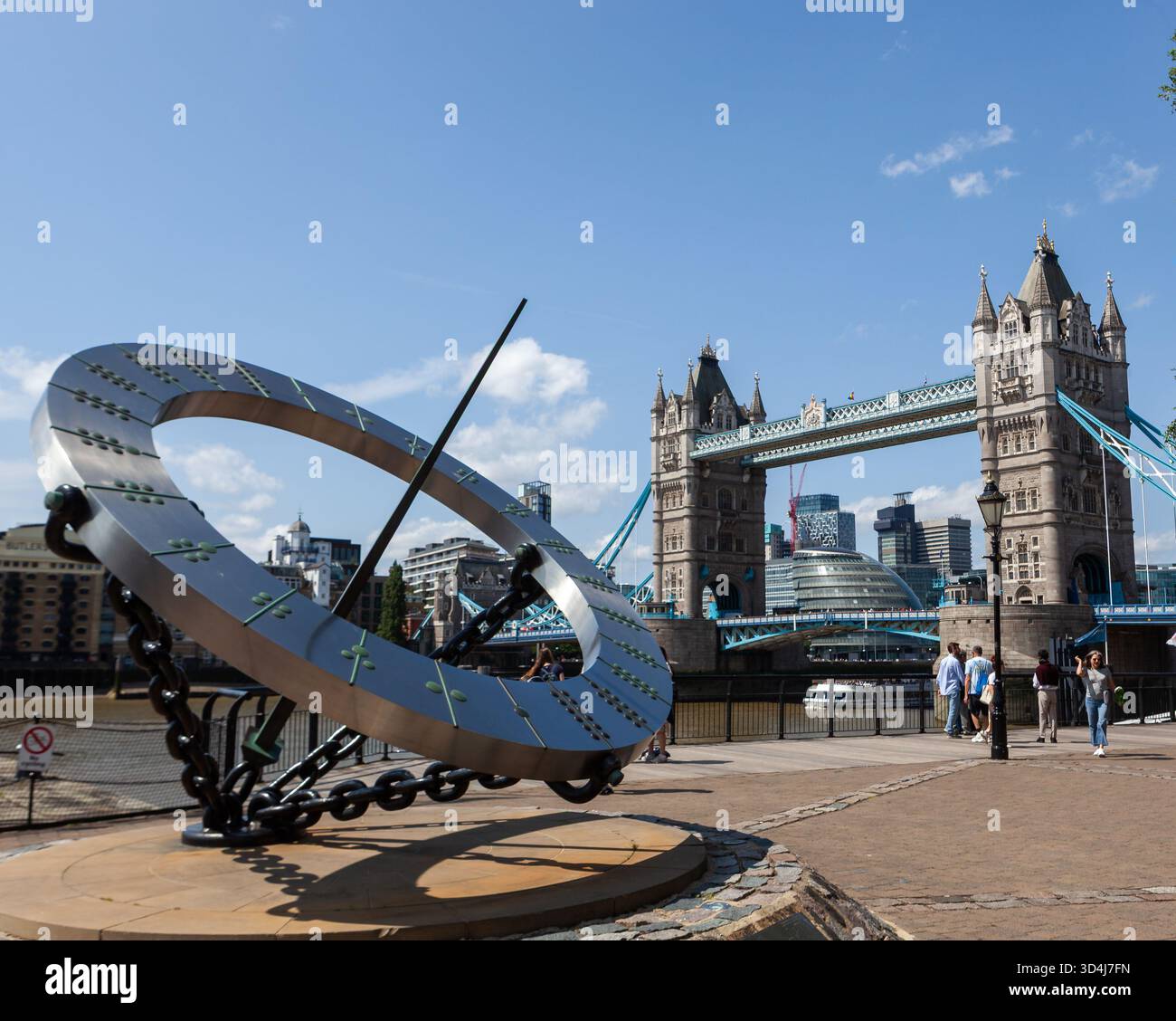 London, UK - June 14, 2025: Modern metal sundial in front of the iconic ...
