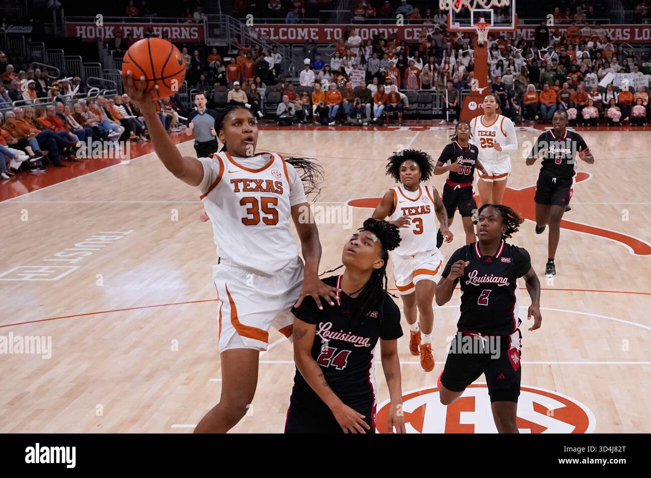 Texas forward Madison Booker (35) shoots over Louisiana Lafayette guard ...