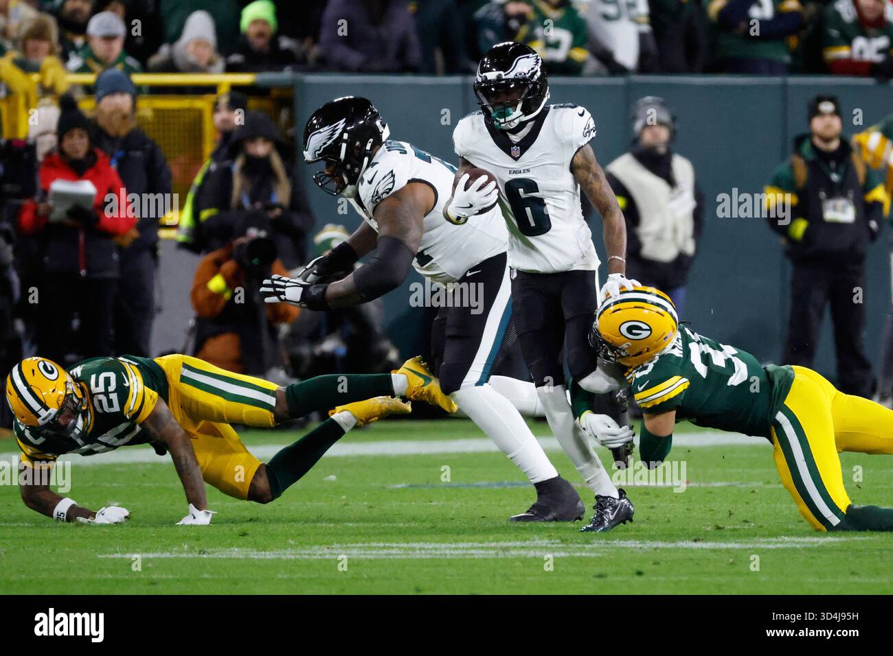 Green Bay Packers safety Evan Williams (33) tackles Philadelphia Eagles ...