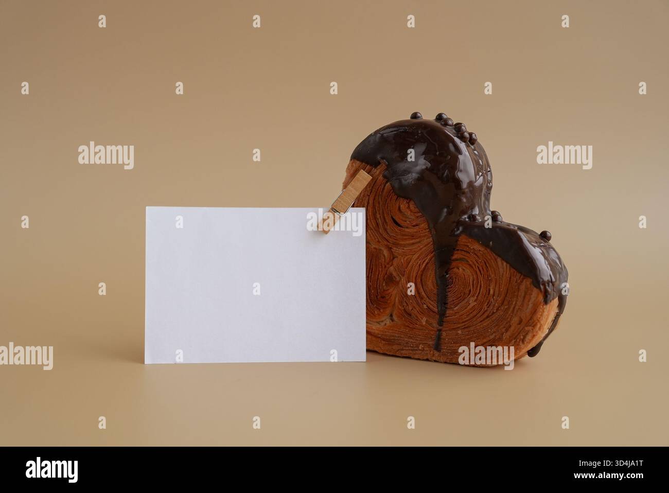 Mock up template paper note card Heart shaped dark chocolate croissant ...