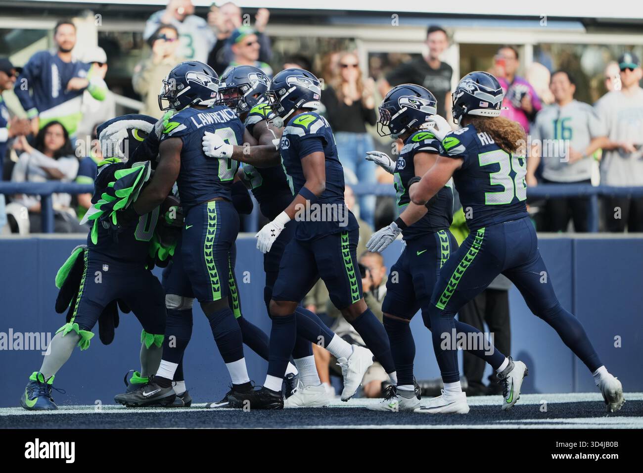 Seattle Seahawks defensive end DeMarcus Lawrence (0) celebrates with ...