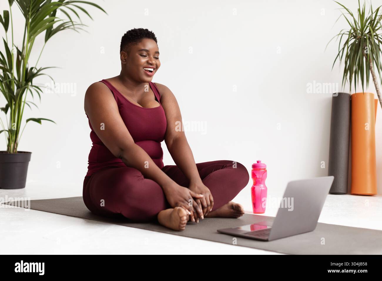 Happy Black Lady Engaging in Online Yoga Class at Home in Sportswear ...