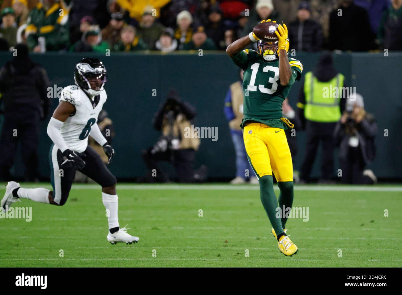 Green Bay Packers wide receiver Dontayvion Wicks (13) makes a catch ...
