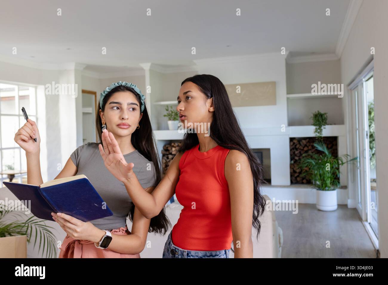 Diverse female friends writing hi-res stock photography and images - Alamy