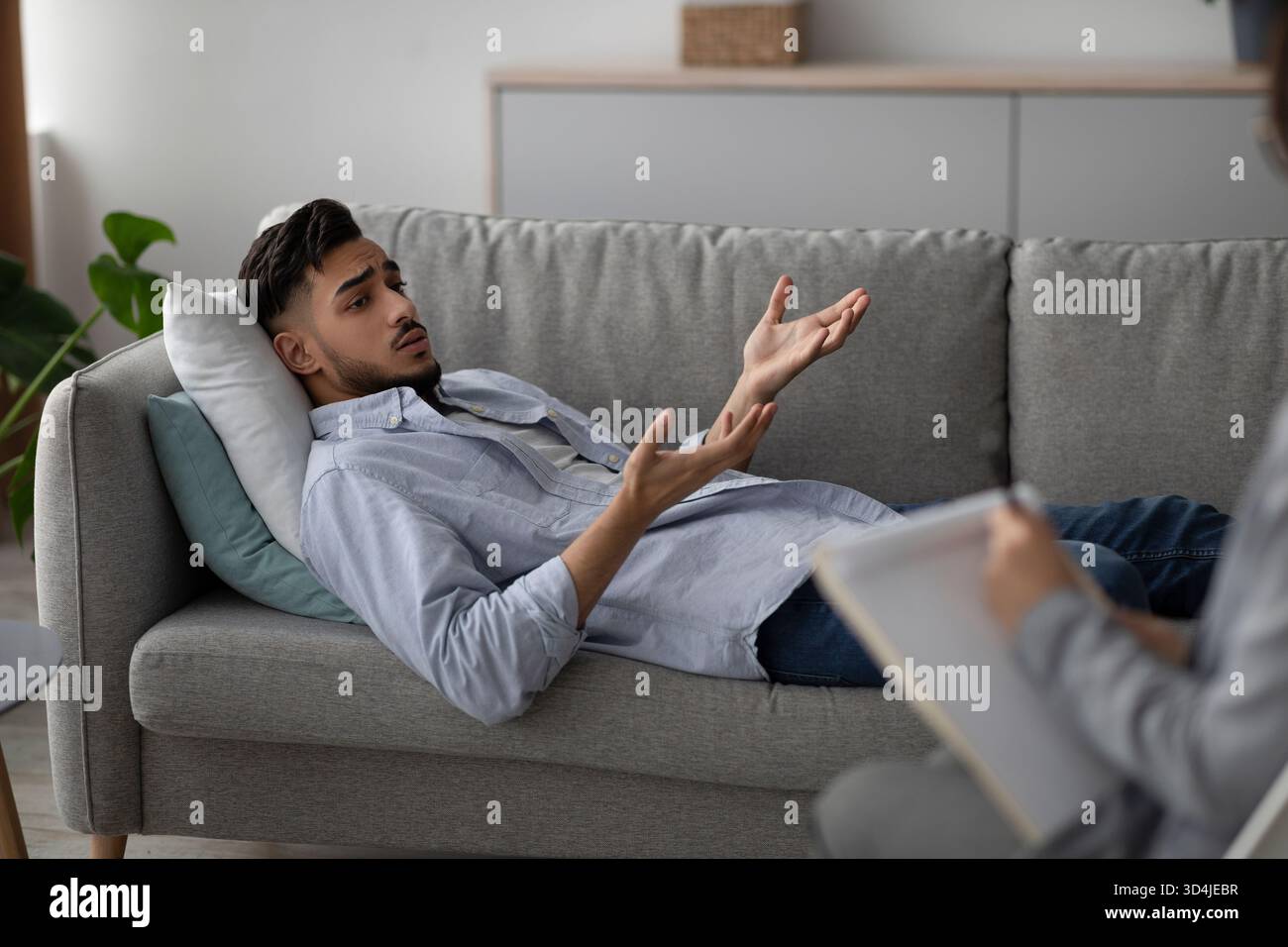 Millennial Man Seeking Professional Help During Therapy Session at ...