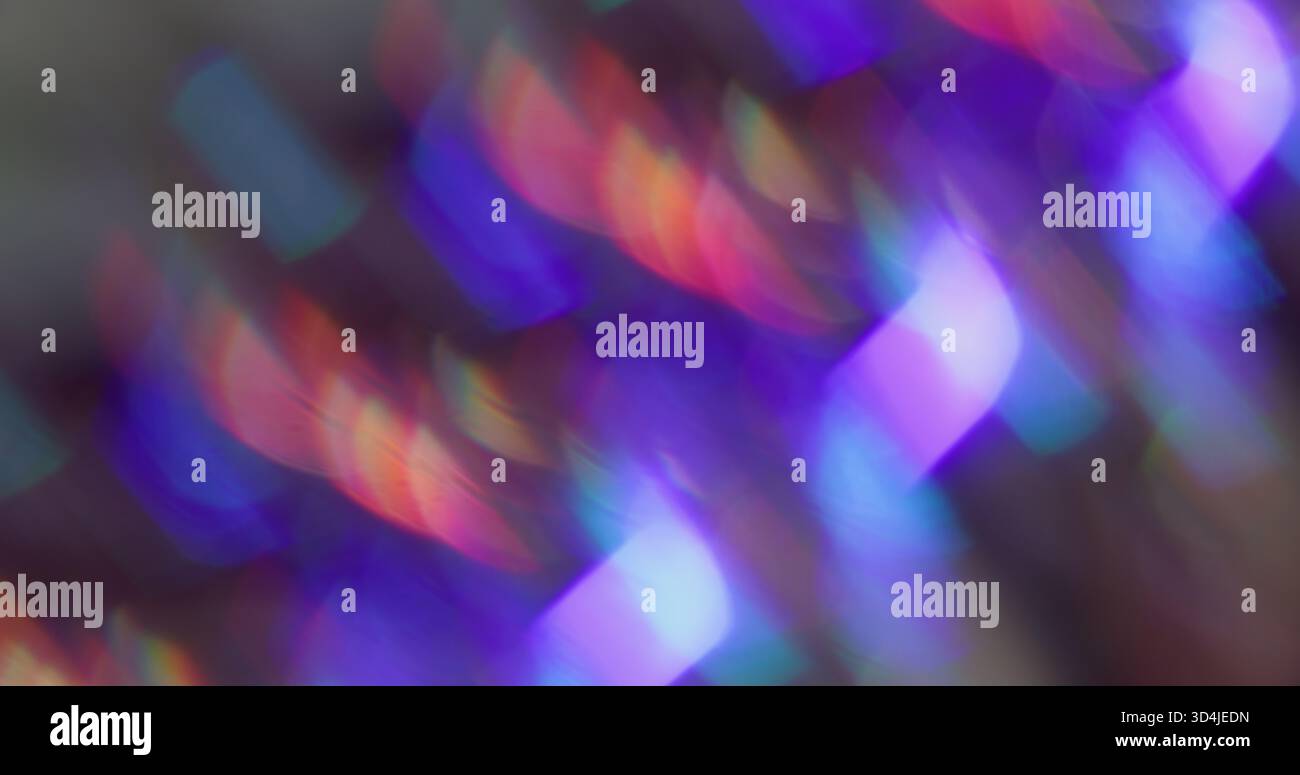 Lens prism blur. Holographic glow leak. Spectrum color twinkle on night ...