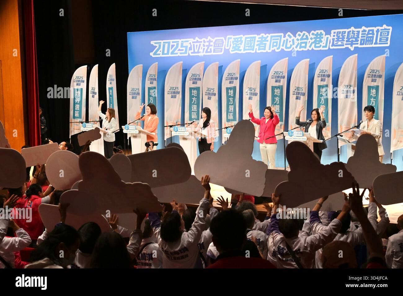 Candidates and voters interacting at the 2025 Legislative Council ...