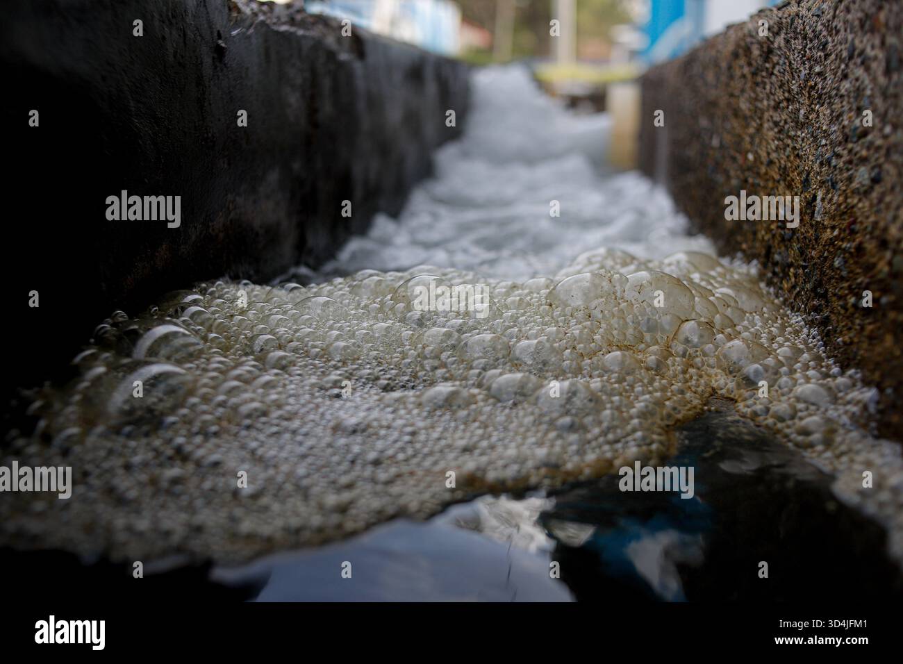 Wastewater Discharge from Industrial Drain Pipe into Sewer System Stock ...
