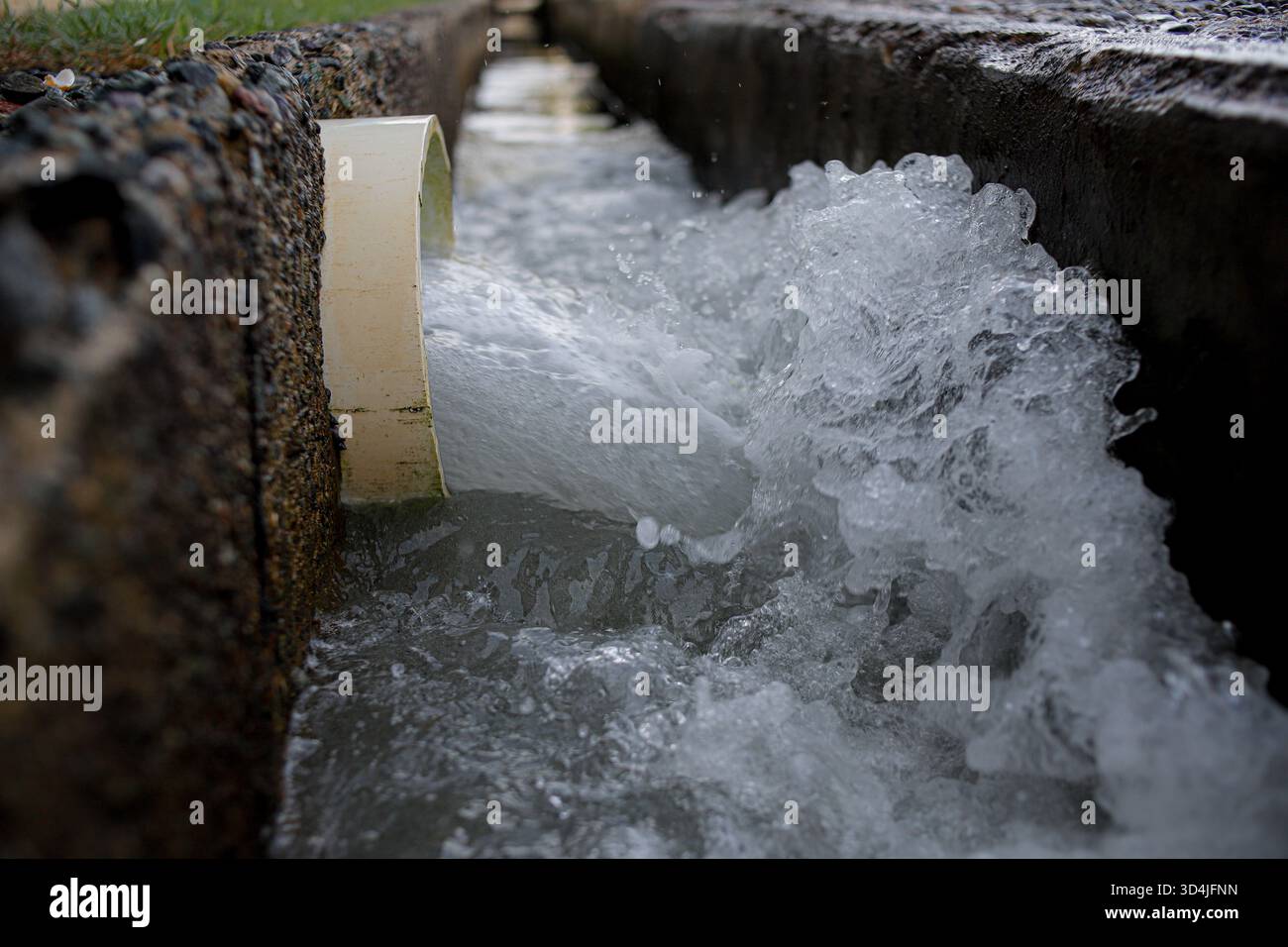 Wastewater Discharge from Industrial Drain Pipe into Sewer System Stock ...