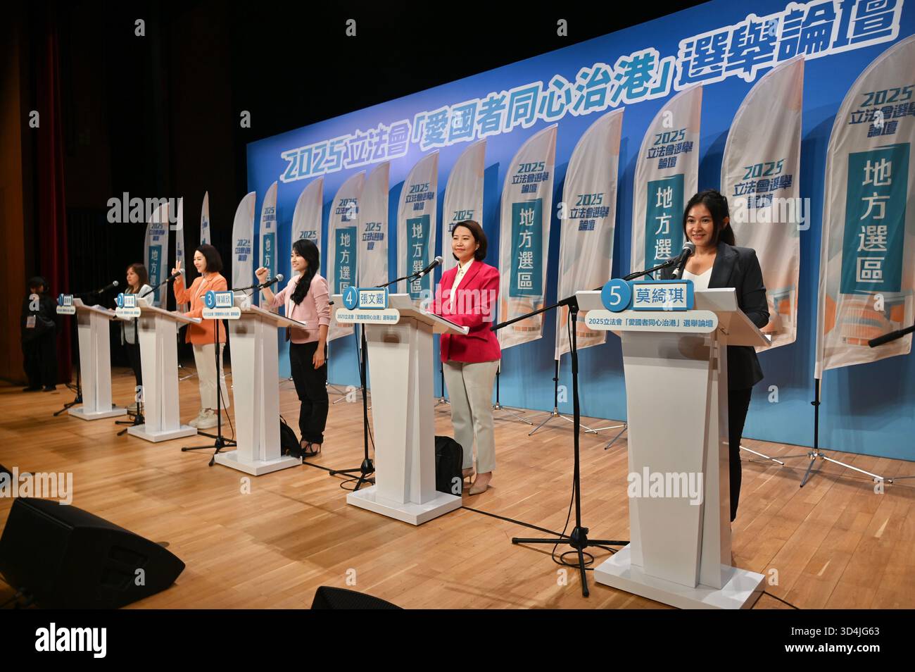 Candidates posing photo at the 2025 Legislative Council election forums ...