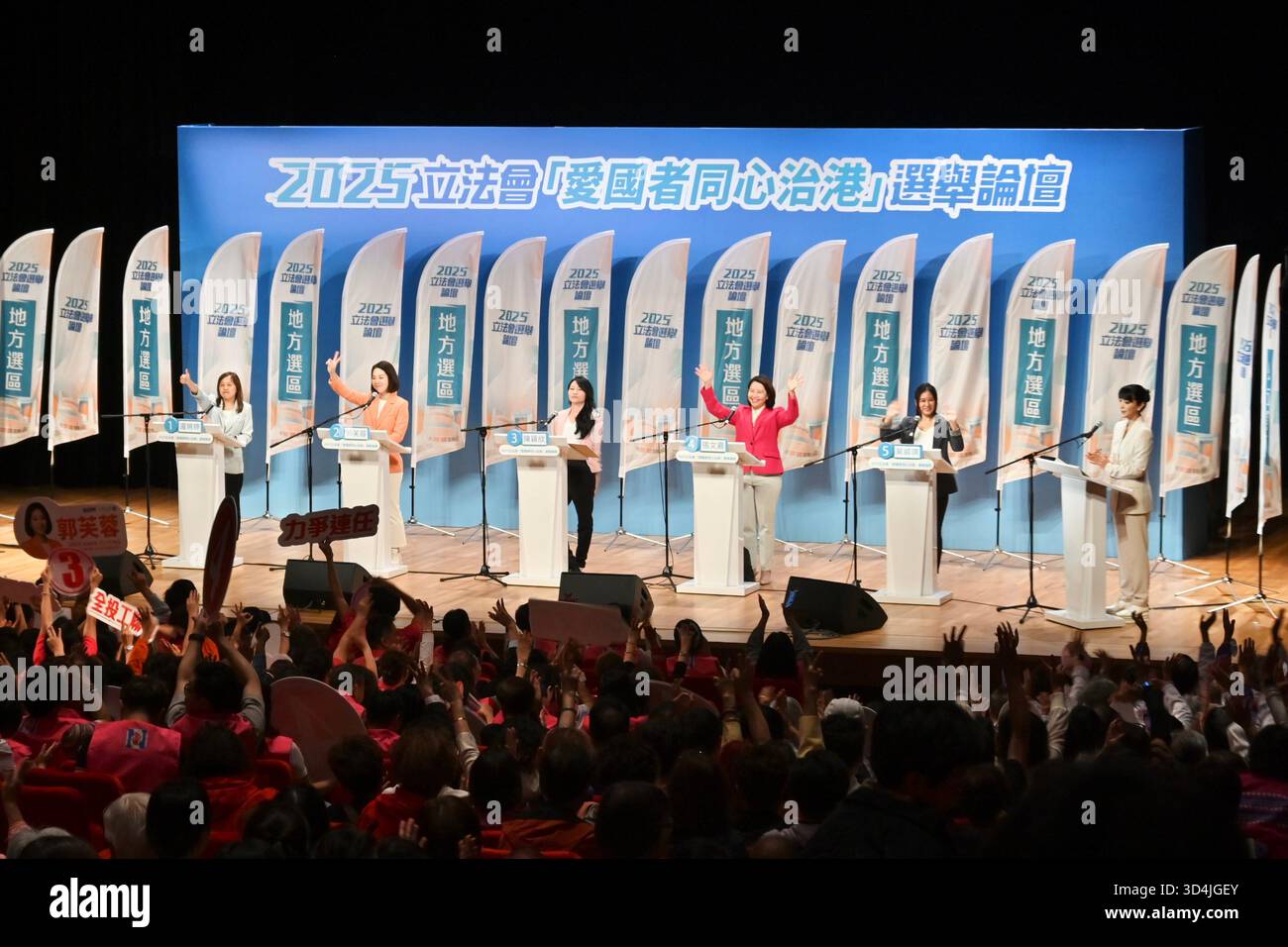 Candidates and voters interacting at the 2025 Legislative Council ...