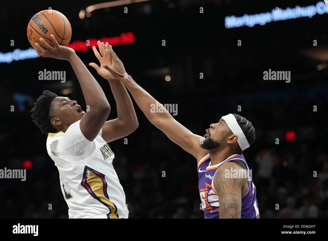 New Orleans Pelicans center Derik Queen (22) shoots over Phoenix Suns ...
