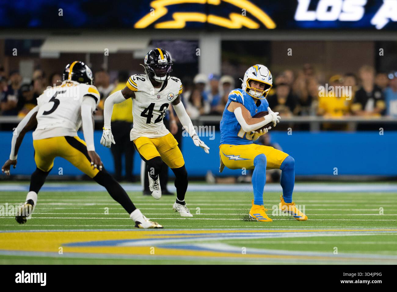 Los Angeles Chargers wide receiver Ladd McConkey (15) catches the ball ...