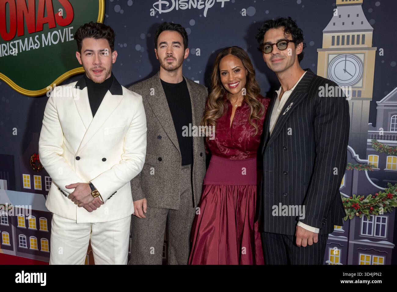 (L-R) Nick Jonas, Kevin Jonas, Ayo Davis and Joe Jonas attend Disney+'s ...
