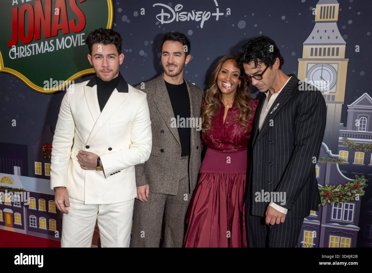 (L-R) Nick Jonas, Kevin Jonas, Ayo Davis and Joe Jonas attend Disney+'s ...