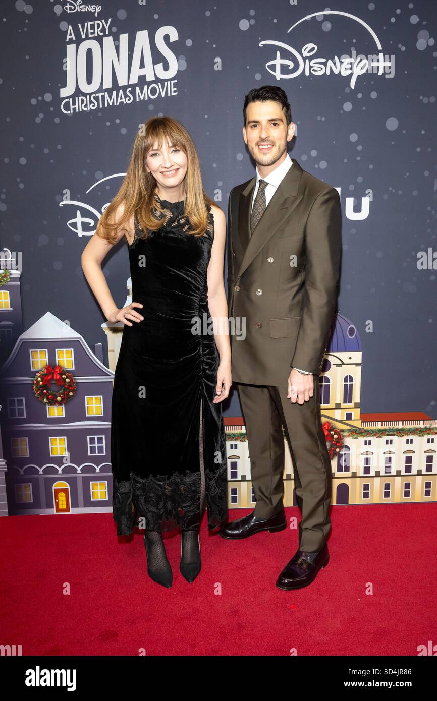 (L-R) Elizabeth Berger and Isaac Aptaker attend Disney+'s "A Very Jonas ...