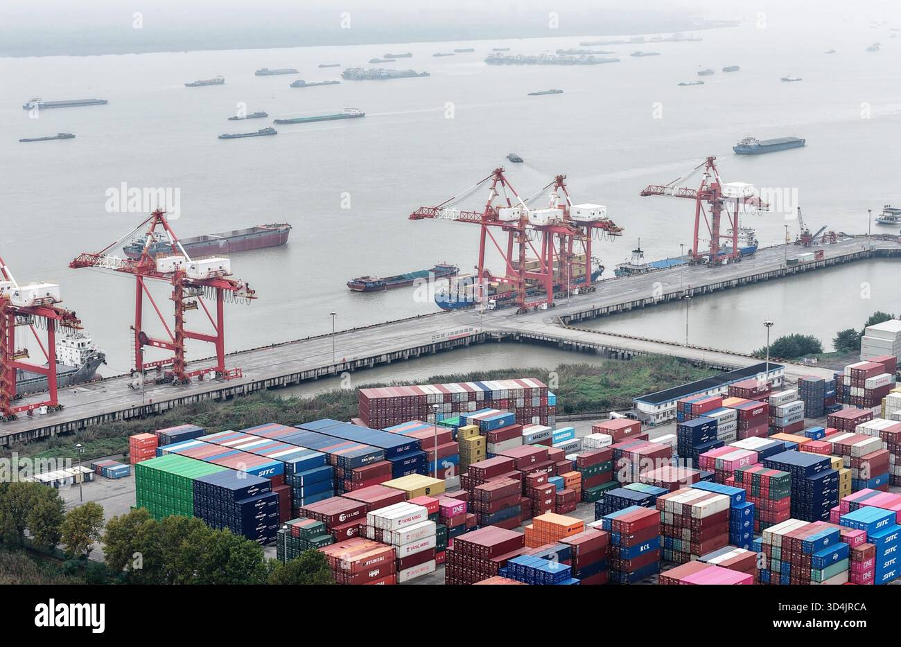 Aerial photo shows the busy container terminal at Yangzhou Port in ...