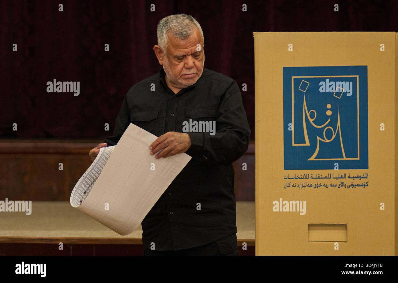 Hadi al-Amiri, commander of the Badr casts his vote in the country's ...