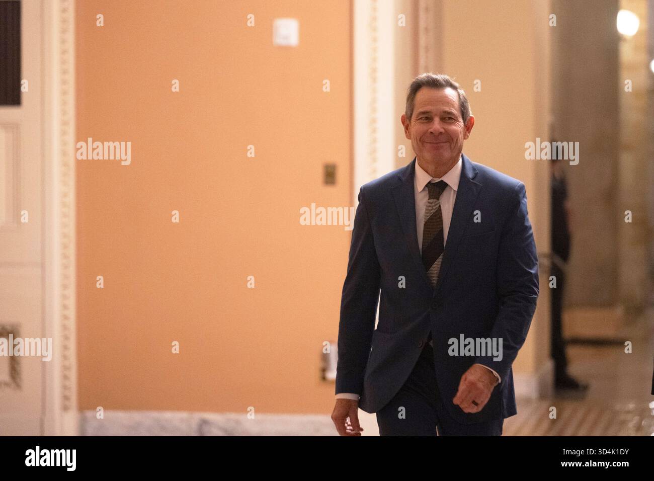 United States Senator John Curtis (Republican of Utah) walks to the ...