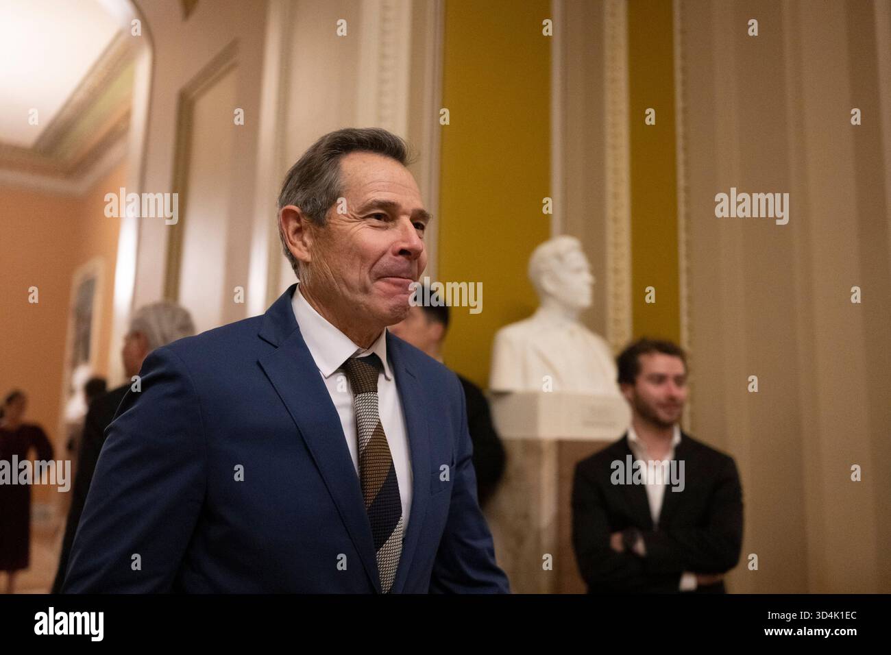 United States Senator John Curtis (Republican of Utah) walks to the ...
