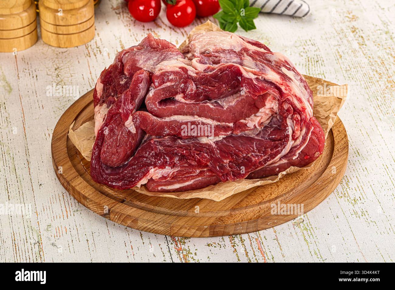 Raw beef meat for cooking over board Stock Photo - Alamy