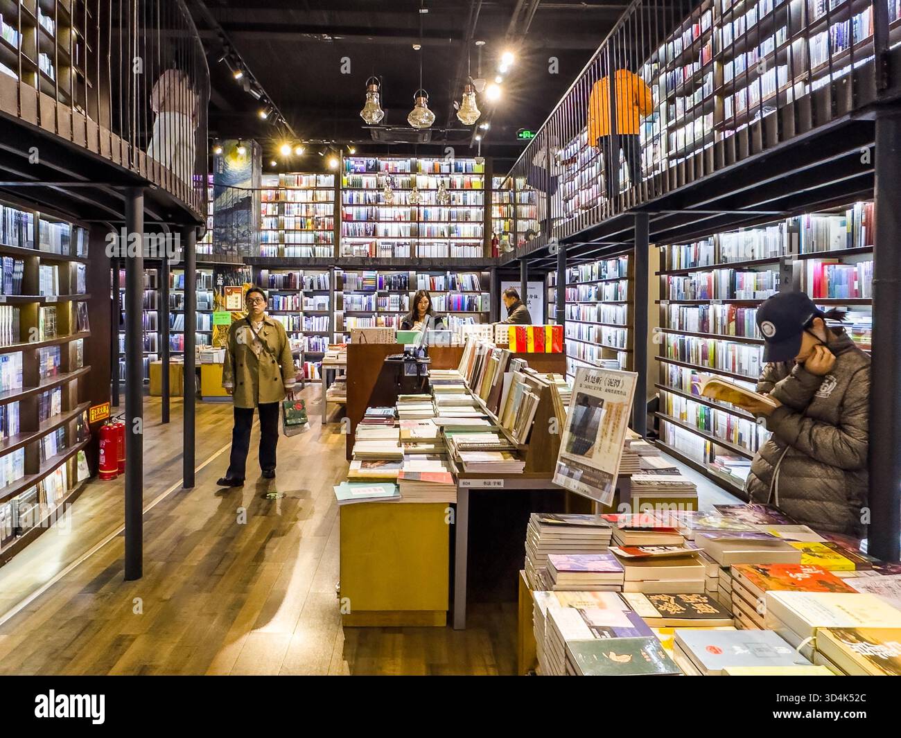 People read books at a bookstore in Beijing, China, 8 November, 2025 ...